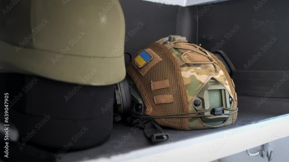 Tactical helmet of the armed forces of Ukraine with a chevron in the ...
