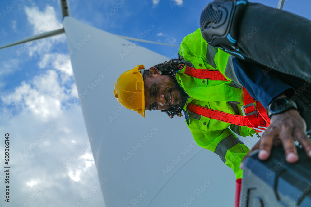 African man workers engineering sitting with confidence with blue ...