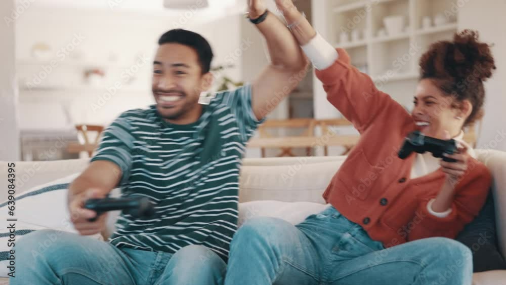 Couple, gaming and sofa with controller, laugh and funny conflict with ...