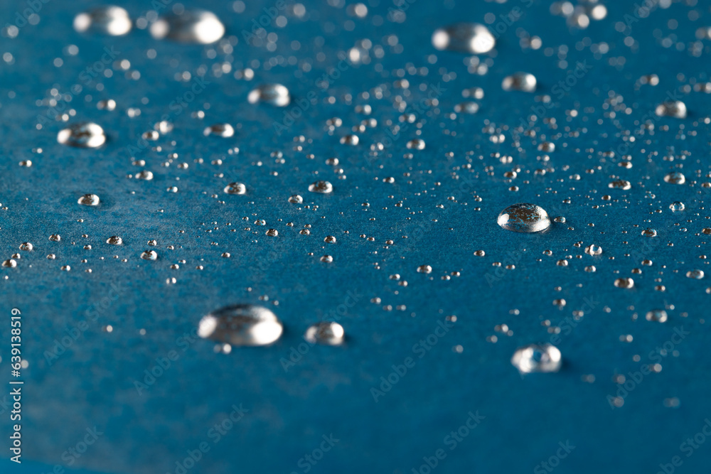 Micro close up of water drops with copy space on blue background Stock ...