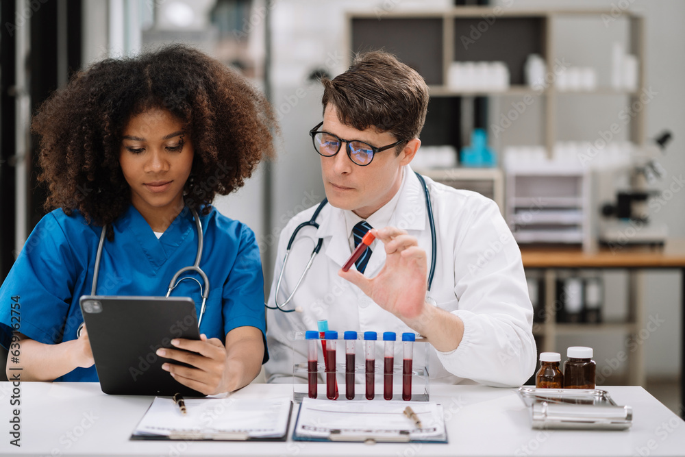 Doctor team, analysis the blood test examination results and medication ...