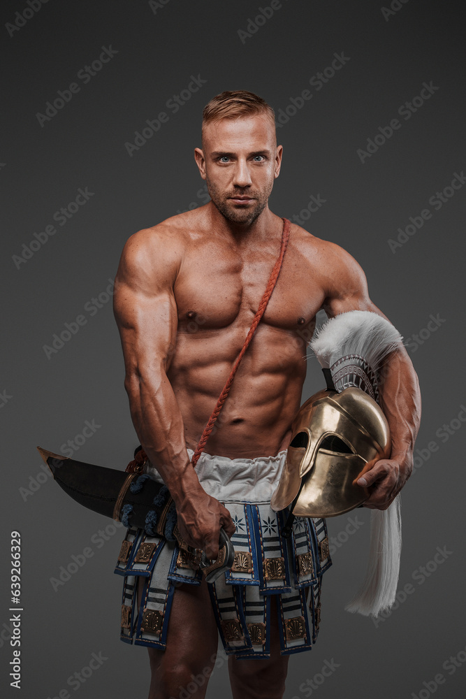 Ancient Greek hoplite warrior, displaying his muscular physique and ...