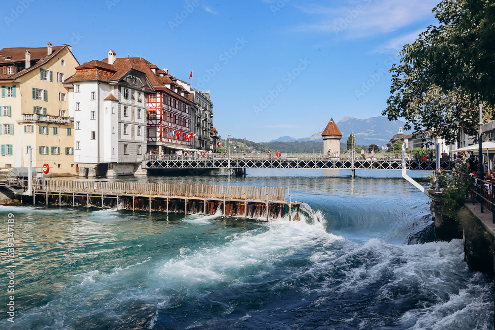 Needle dam in the Reuss in Lucerne, Switzerland. A needle dam is a weir ...