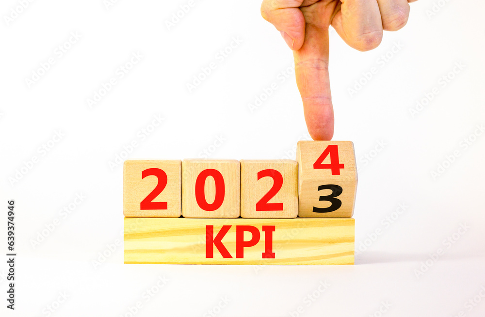 Kpi Key Performance Indicator Symbol Businessman Turns Wooden Cubes