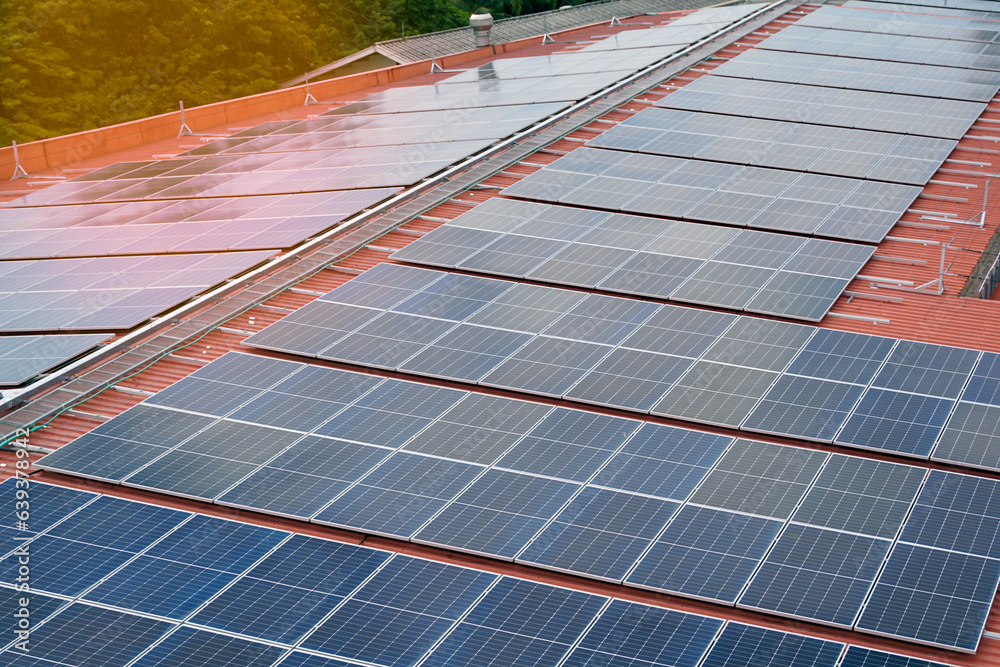 A solar roof system in a building that installs solar panels on the ...