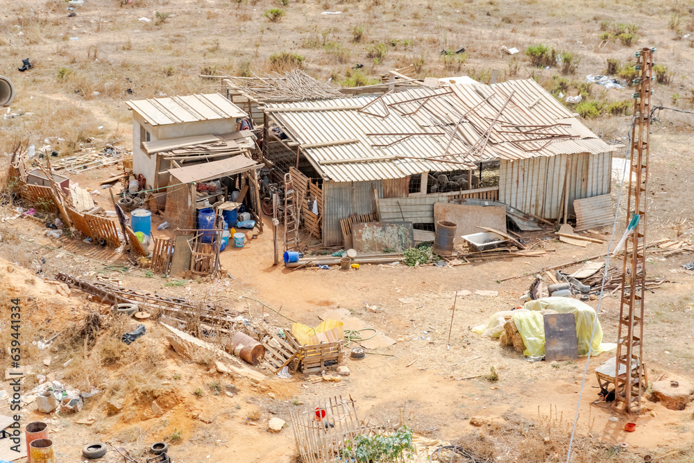 Aerial view of a galvanized zinc hut serving as makeshift shelter for ...