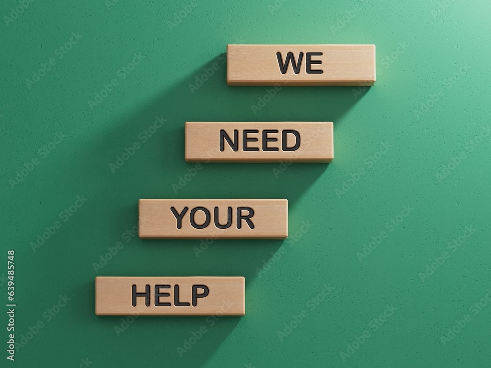 We need your help symbol. Wooden blocks with words We need your help ...