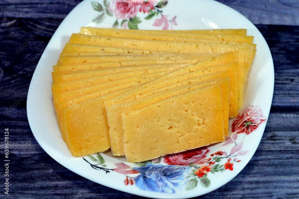 Slices of Egyptian Rumi cheese, also called gebna romiya or gebna ...