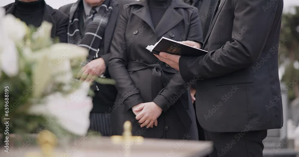 Bible, hands and family at funeral, cemetery or burial ceremony ...