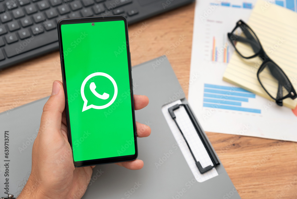 Whatsapp logo on the smartphone screen Stock Photo | Adobe Stock