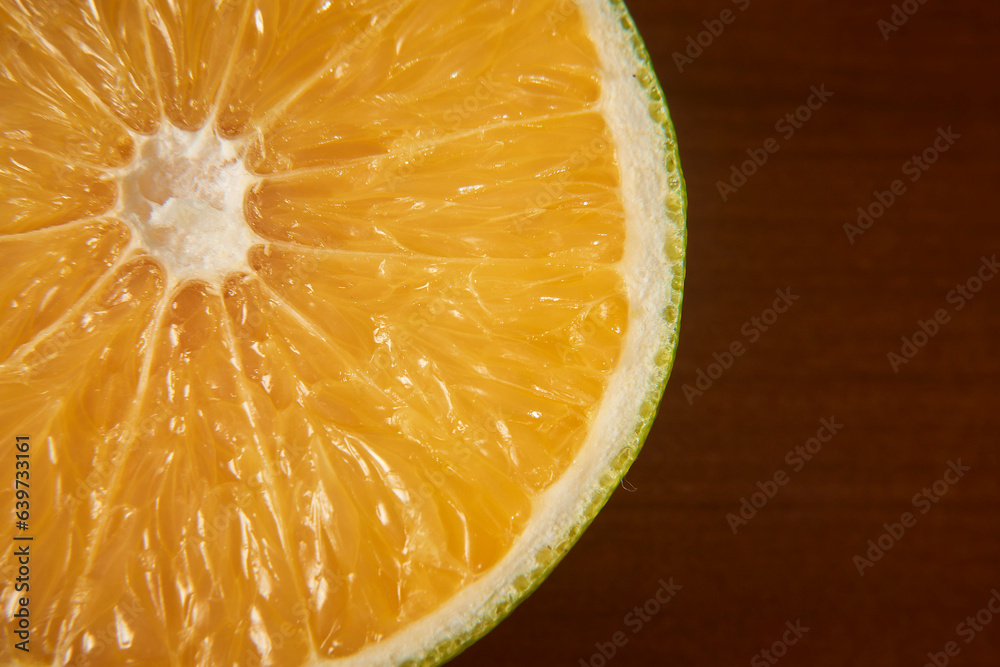 Citrus Unveiled: An intimate and detailed macro shot of a split-open ...