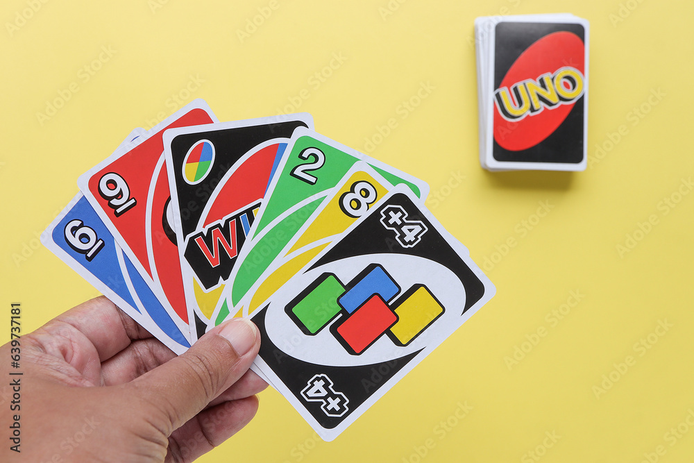 Bangkok, Thailand : August 13, 2023 : Uno game cards in the player's ...