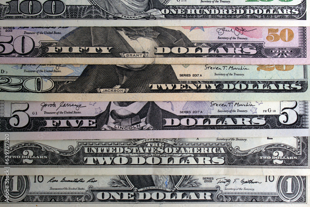 Top view. Set of American banknotes of different denominations ...