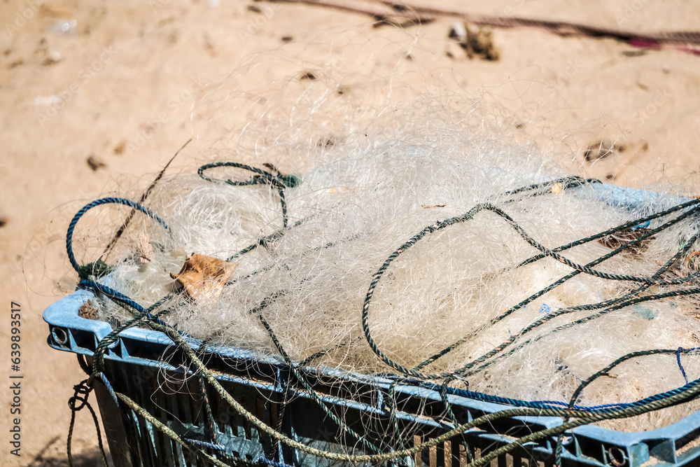 Piles of fishermen fishing nets after being used to catch fish in the ...