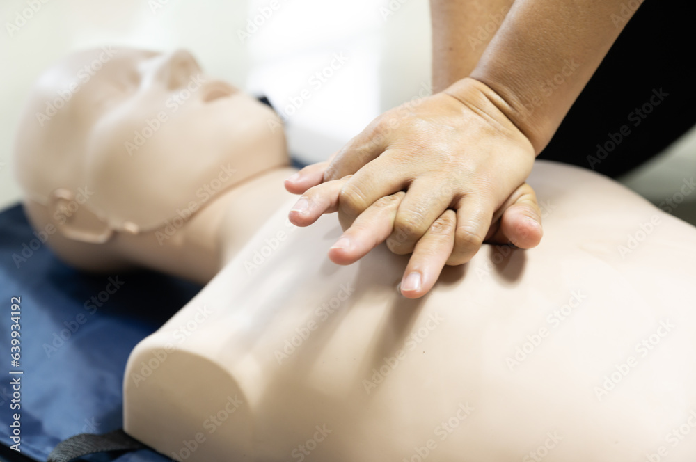 Demonstrating CPR (Cardiopulmonary resuscitation) training medical ...