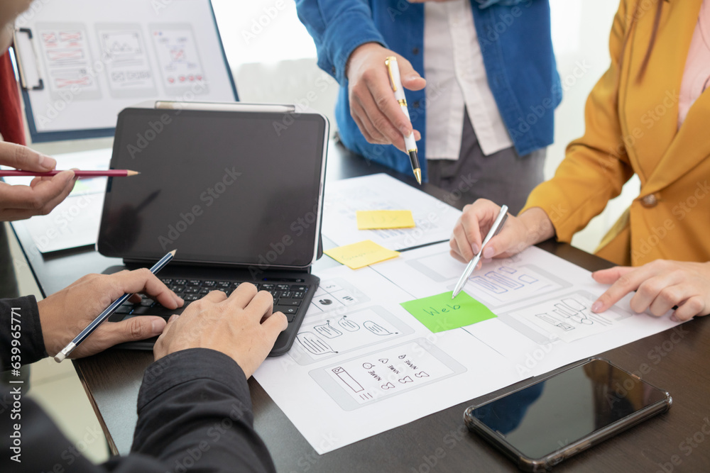 team of UI UX web designer are working together to develop mobile ... team of UI UX web designer are working together to develop mobile ...