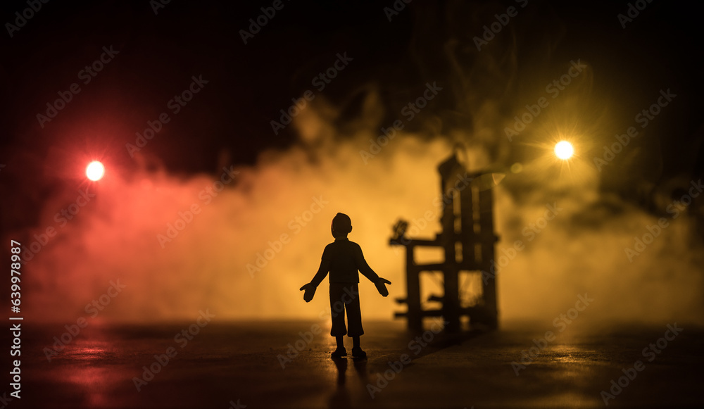 Execution concept. Death penalty electric chair miniature in selective ...