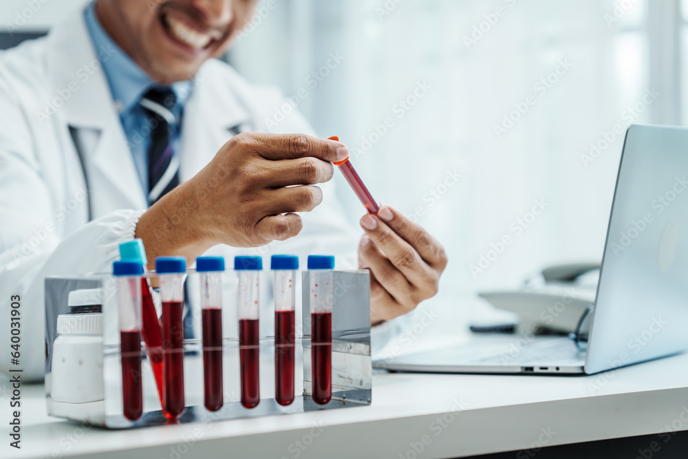 Clinical Laboratory Tests, Asian hematologist checking medically ...