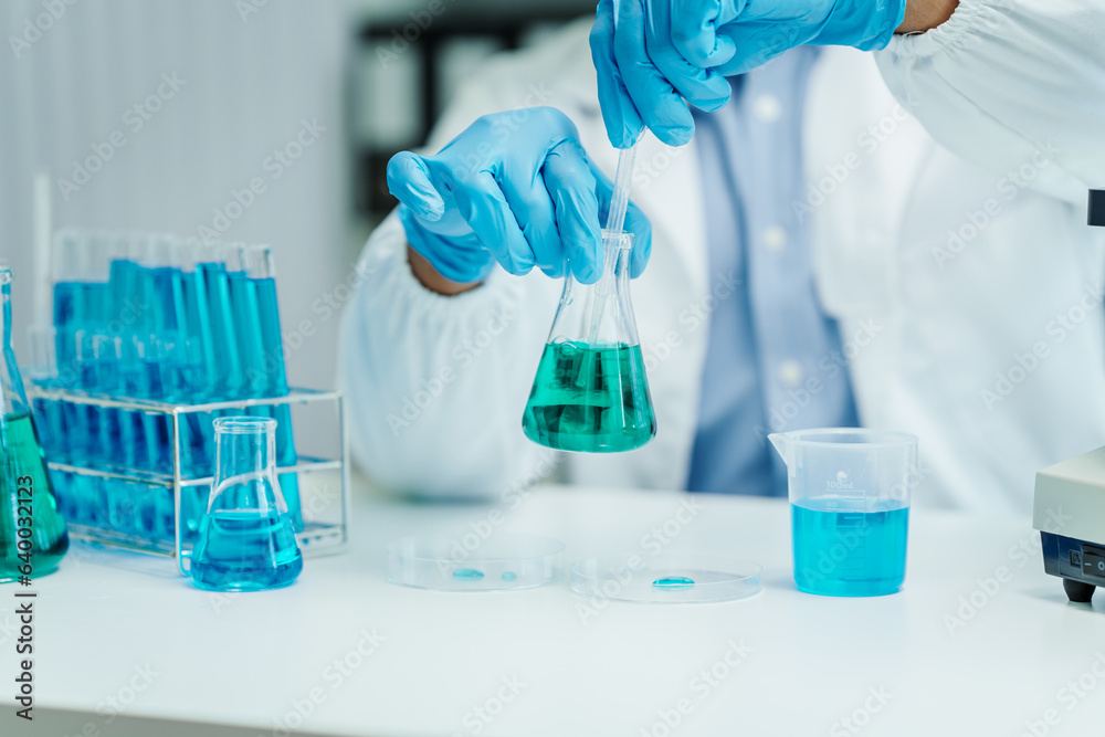 Asian male scientists white coat conducting research investigations ...