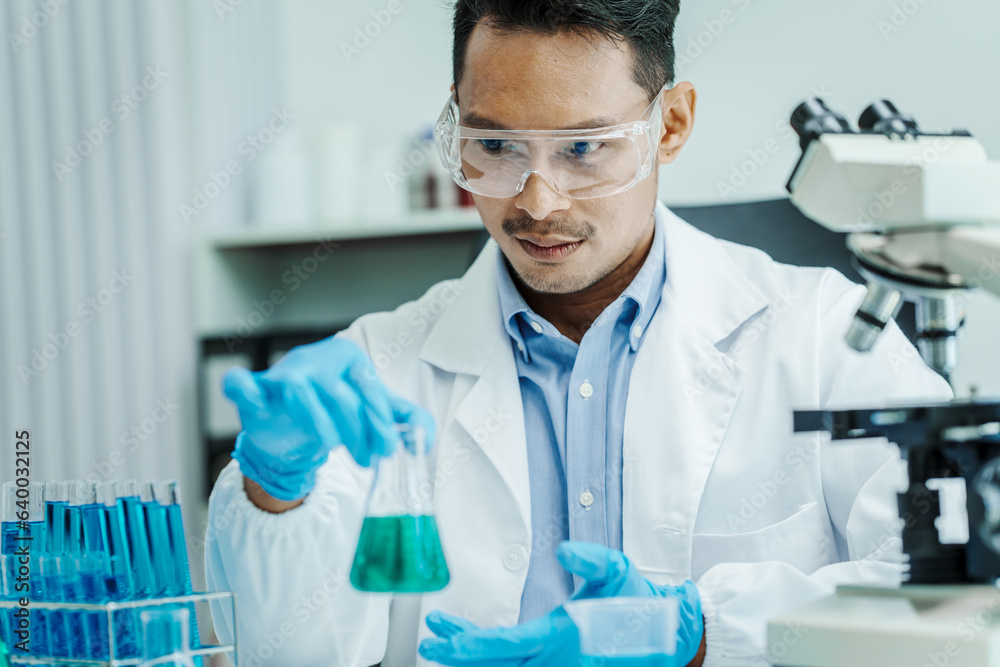 Asian male scientists white coat conducting research investigations ...