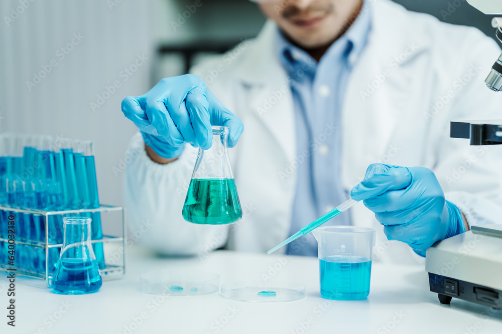 Asian male scientists white coat conducting research investigations ...