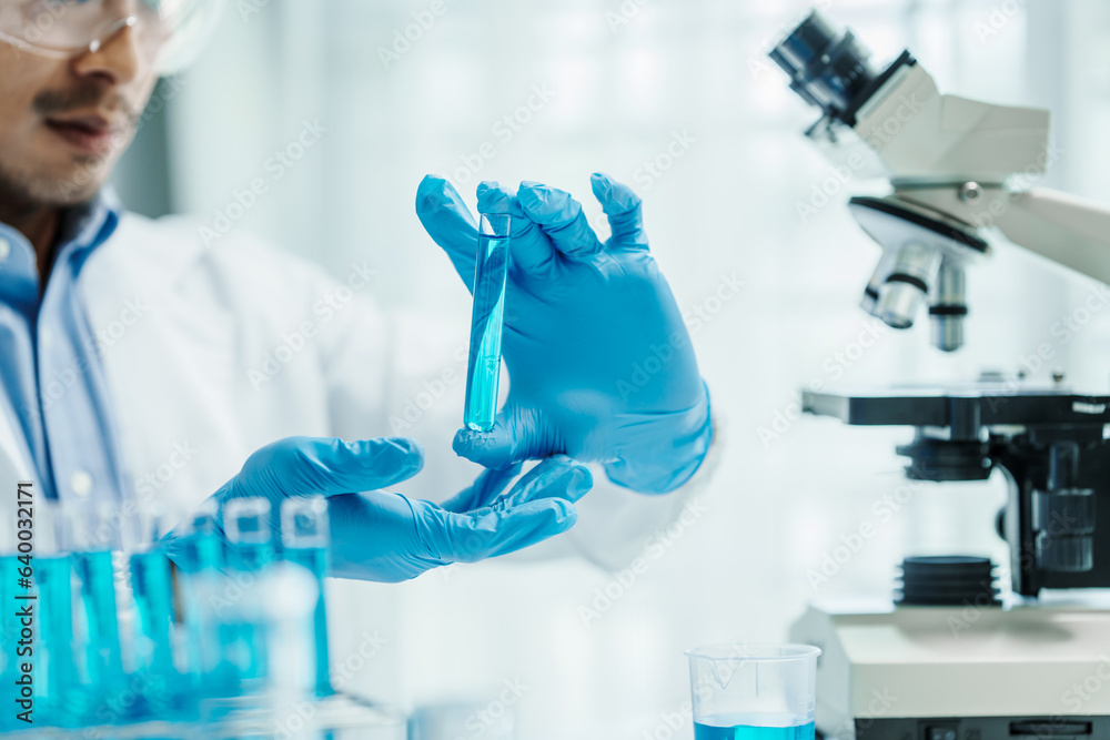 Asian male scientists white coat conducting research investigations ...