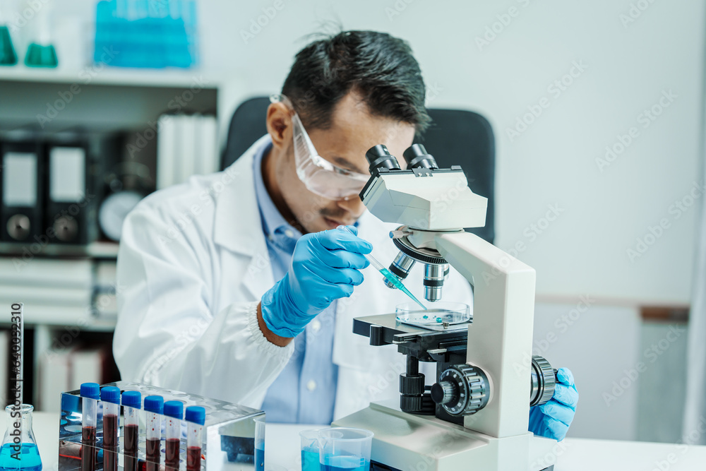 Asian male scientists white coat conducting research investigations ...