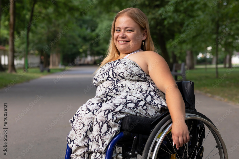 Smiling Happy Young Woman With Short Stature On Wheelchair Enjoys Time ...