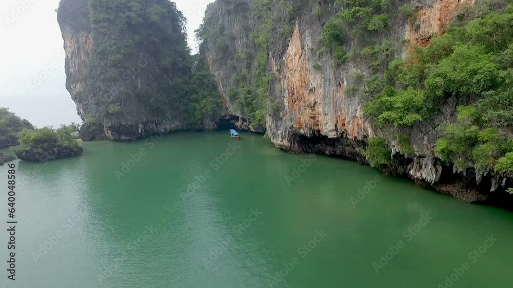 Aerial view amazing Panak island has a cave entrance into the canyon ...
