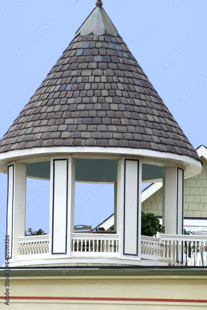 a circular balcony rotunda with columns under a cone shaped roof Stock ...