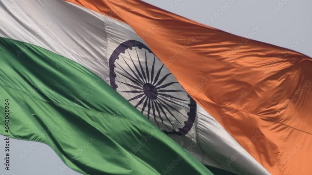 India flag flying high at Connaught Place with pride in blue sky, India ...