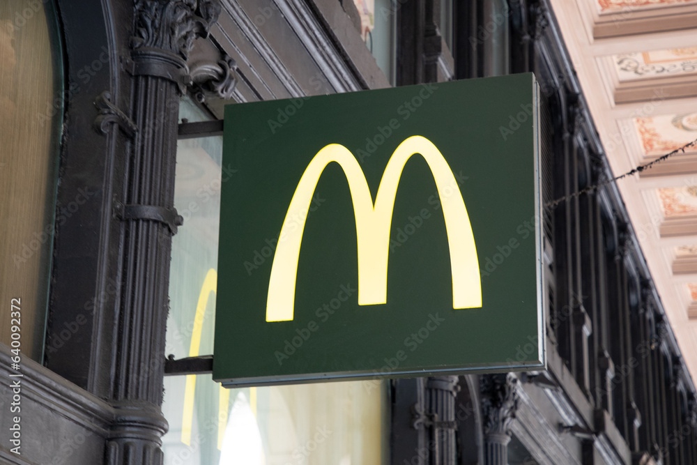 McDonald's sign brand m logo text on Restaurant wall exterior of us ...