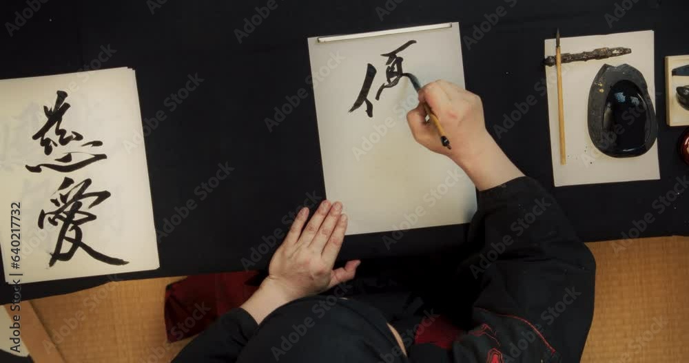 Top Down View of a Japanese Male Calligraphy Artist Drawing Aesthetic ...