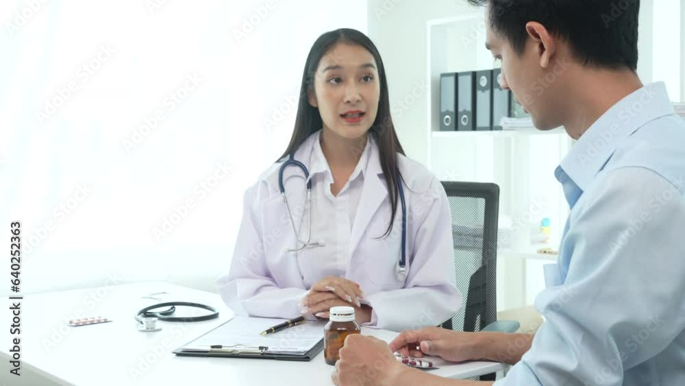 4k slow motion of female doctor specialist and male patient Office ...