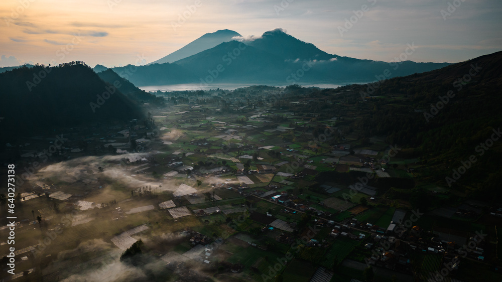 Foggy Bali Morning: Aerial Sunrise View of Mount Batur Village ...