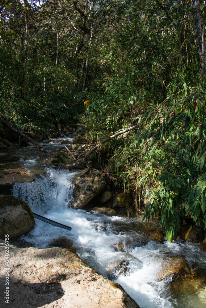 Small waterfall formed by the Vilcanota river on the way from ...