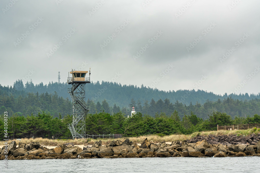 Coast Guard lookout tower and the Umpqua River Lighthouse in the ...