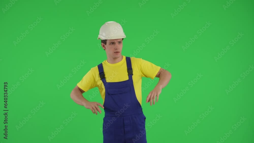Medium green screen isolated chroma key video of a young construction ...