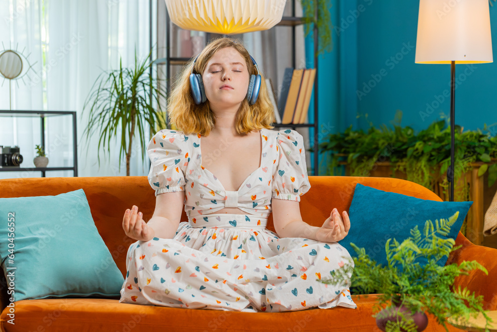 Keep calm down, relax, inner balance. Redhead woman breathes deeply ...