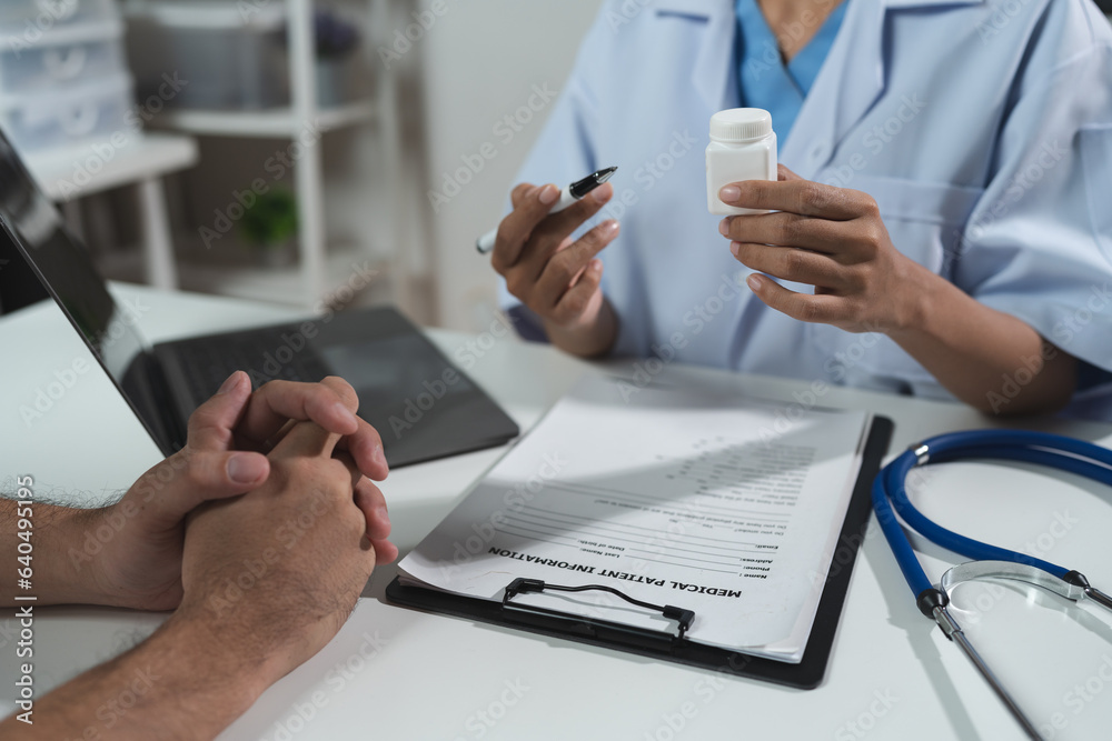 Asian female doctor or medical specialist examining a patient Ask for ...
