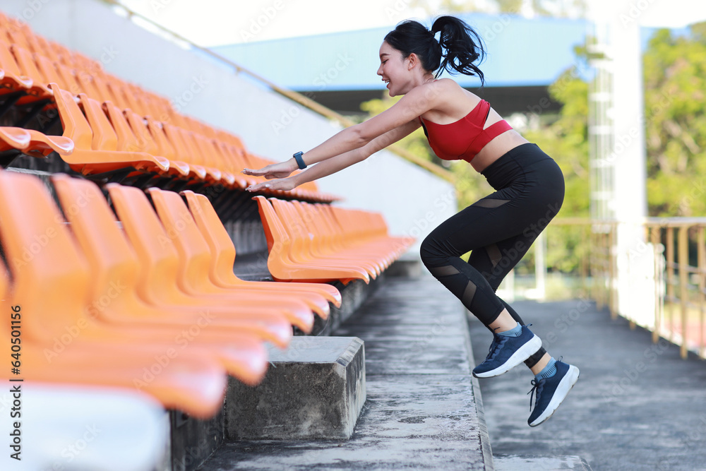 Strong and beautiful asian fitness female sportswoman doing squat ...