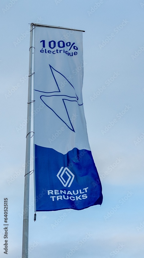Renault trucks ev 100% electric truck sign brand and text logo on sky ...