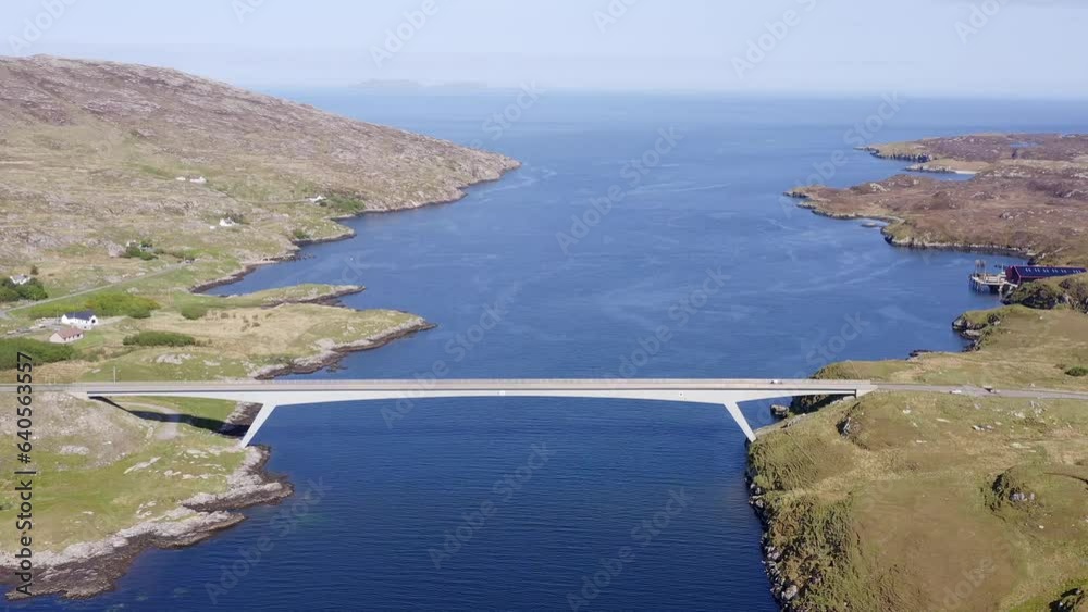 Drone shot circling the bridge connecting the Isle of Scalpay to the ...