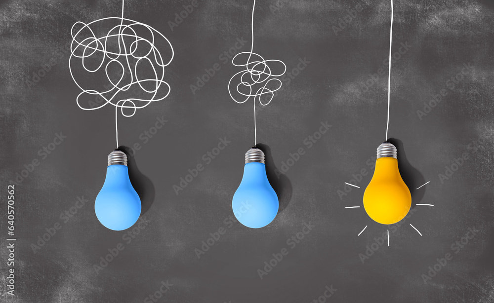 Clarifying complex ideas through the glow of lightbulbs - Flat lay ...