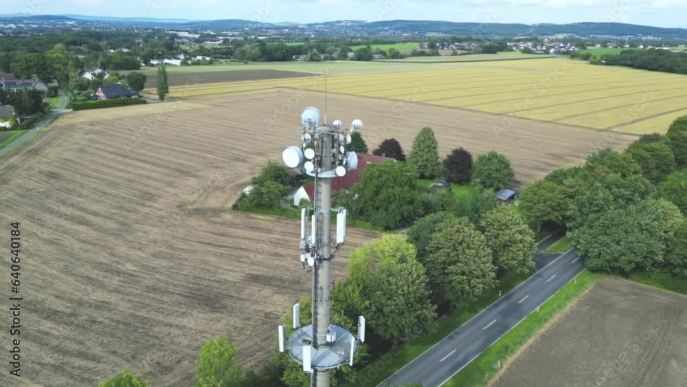 360 degree rotation drone around communication tower with countless ...
