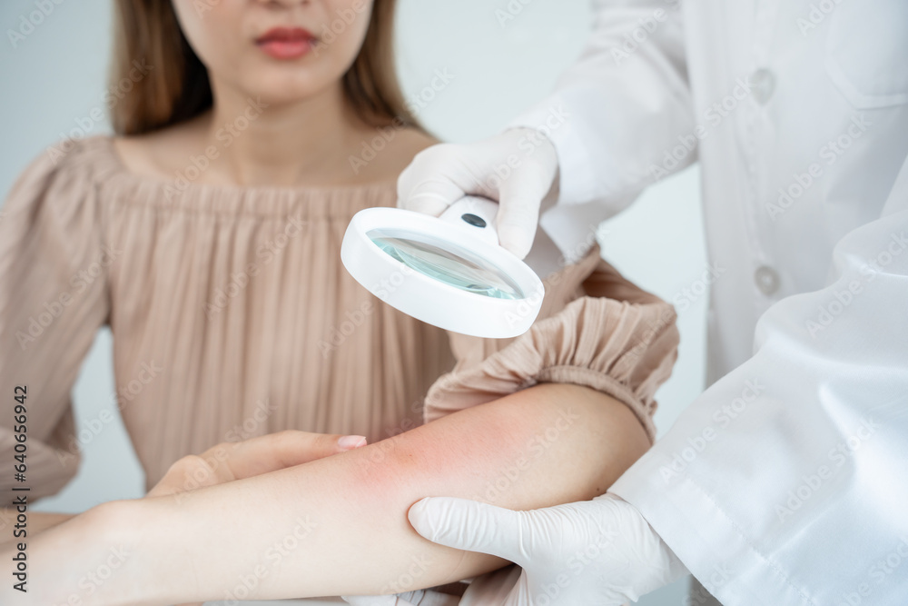skin problem and beauty of asian girl. Dermatologist use magnifying ...