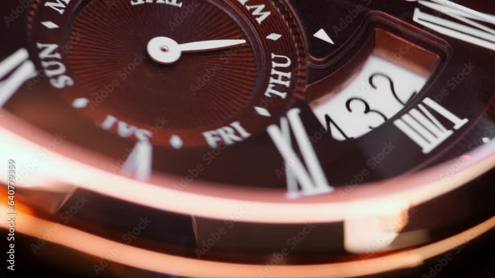 Extreme closeup of second arrow passing by on clock face. Lengthwise ...