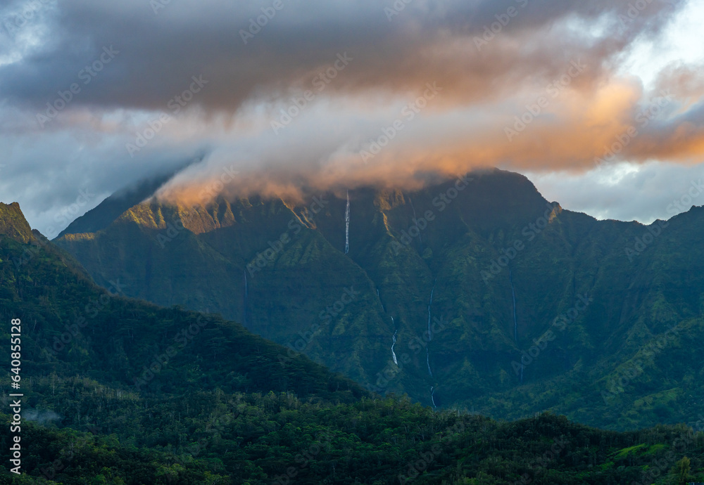 Mountains of the Na Pali mountain range in the distance above Hanalei ...