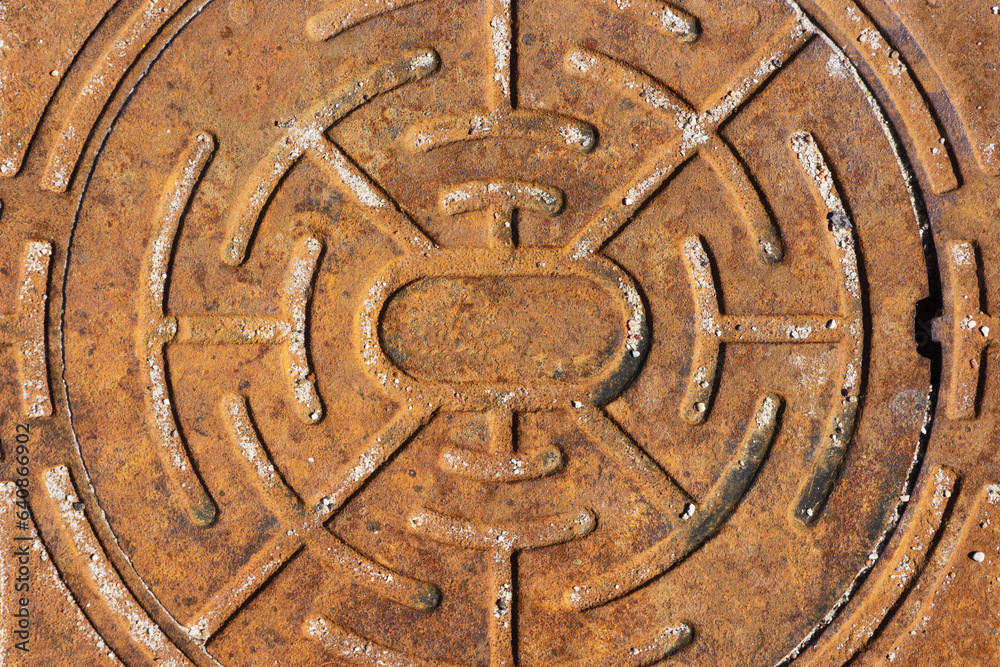 Round manhole on concrete drain system cover. Urban sewer background ...