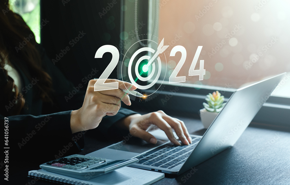 business goals & trends 2024. analytical businesswoman planning ...